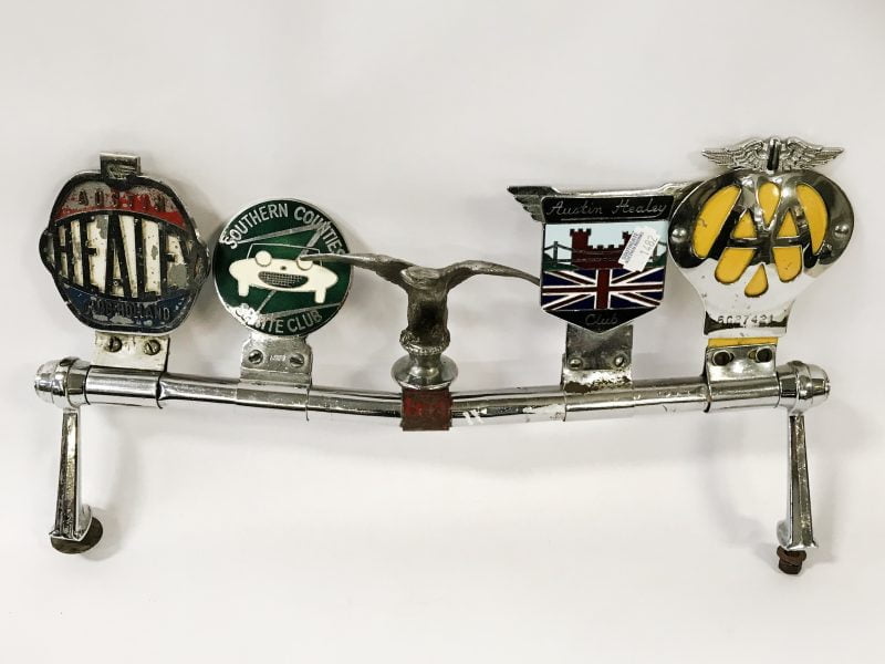 EARLY CHROME CAR BADGE BAR & BADGES - Southgate Auction Rooms