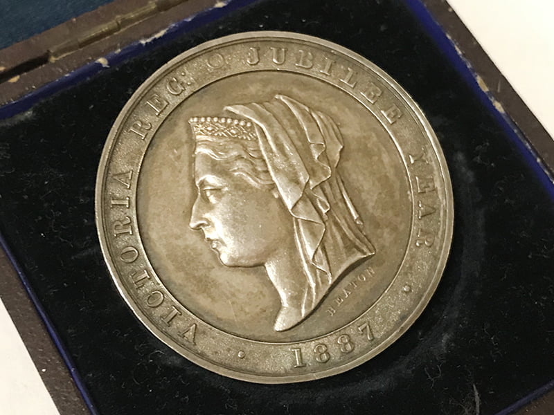 COLLECTION OF FOUR MEDALS INCLUDING WHITE METAL 1887 QUEEN VICTORIA ...