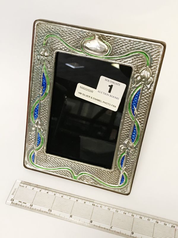 HM SILVER & ENAMEL PHOTO FRAME 19CMX15CM - Southgate Auction Rooms