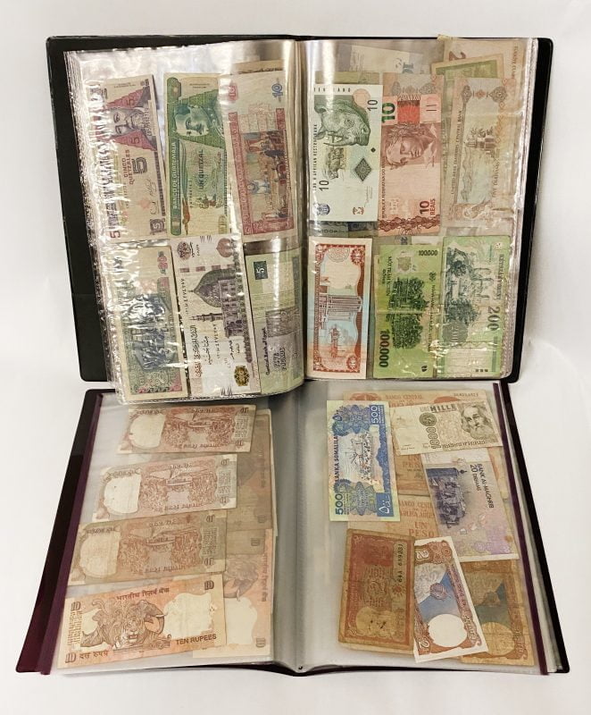 COLLECTION OF WORLD BANKNOTES IN 2 FOLDERS A/F - Southgate Auction Rooms