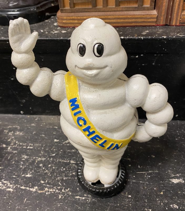 CAST IRON MICHELIN MAN MONEY BOX - Southgate Auction Rooms