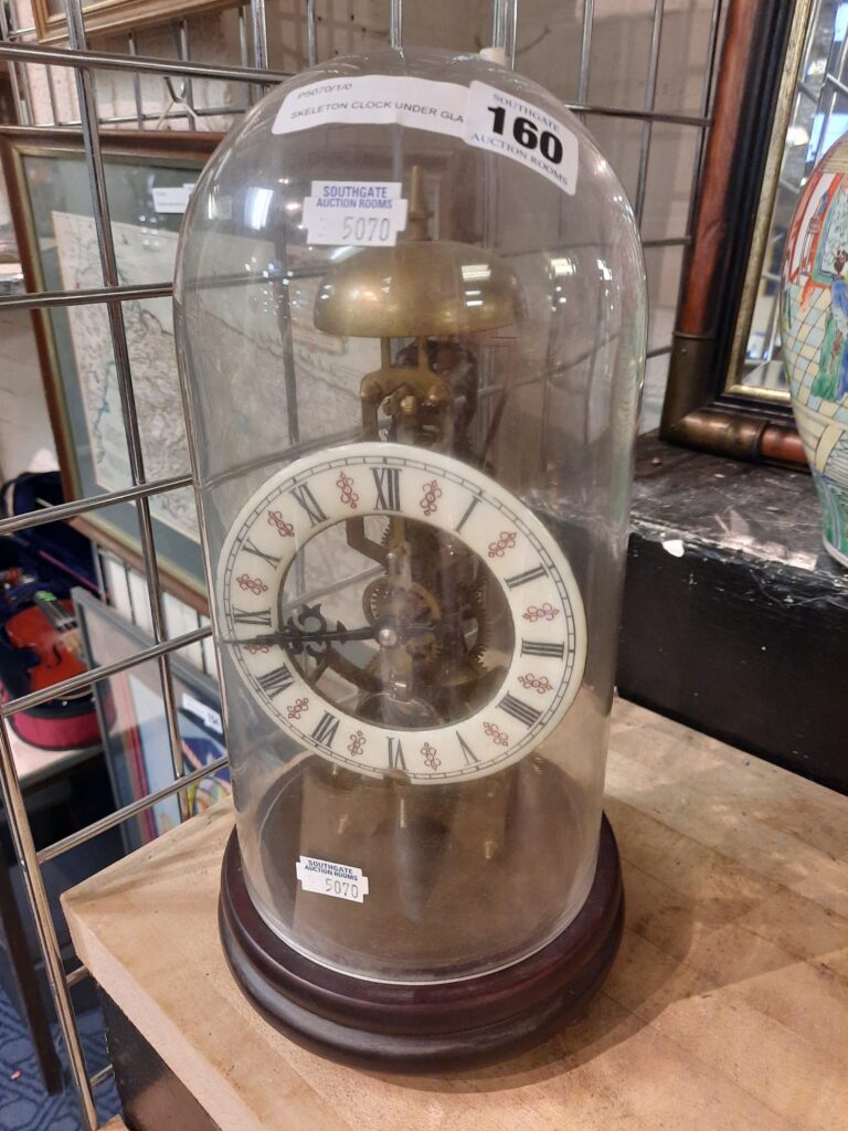 SKELETON CLOCK UNDER GLASS DOME 32CMS (H) APPROX - Southgate Auction Rooms