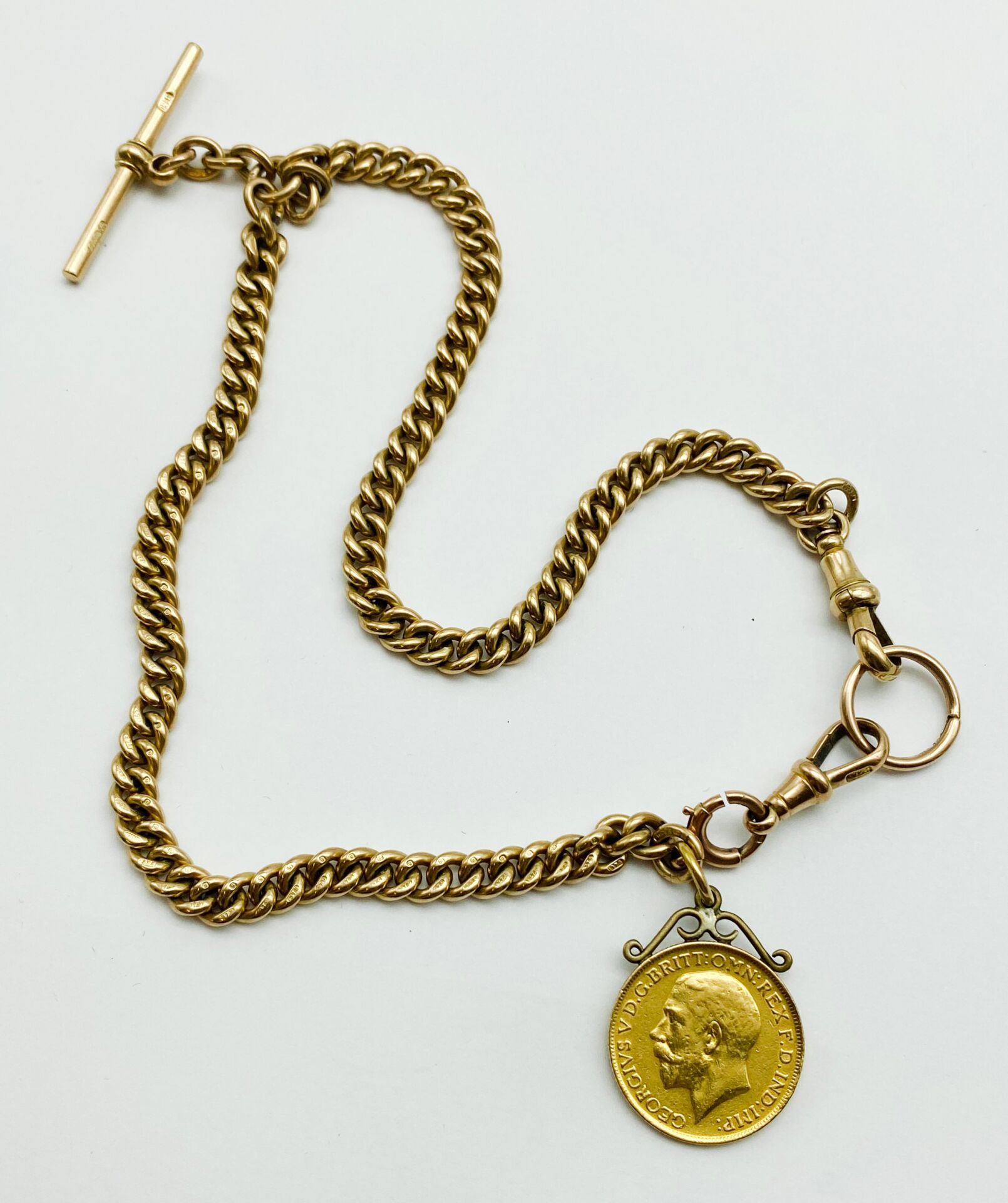 9CT GOLD FOB CHAIN WITH A FULL 1911 SOVEREIGN - 52.6 GRAMS IN TOTAL ...