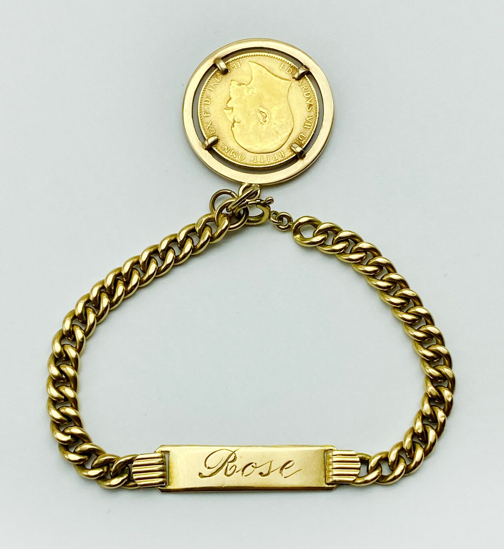 FULL 1910 SOVEREIGN WITH AN 18CT GOLD MOUNT & CHAIN - Southgate Auction ...