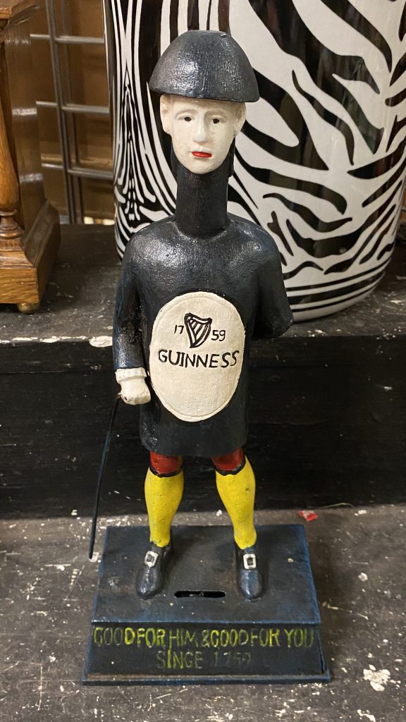 CAST IRON GUINNESS MONEY BOX - Southgate Auction Rooms