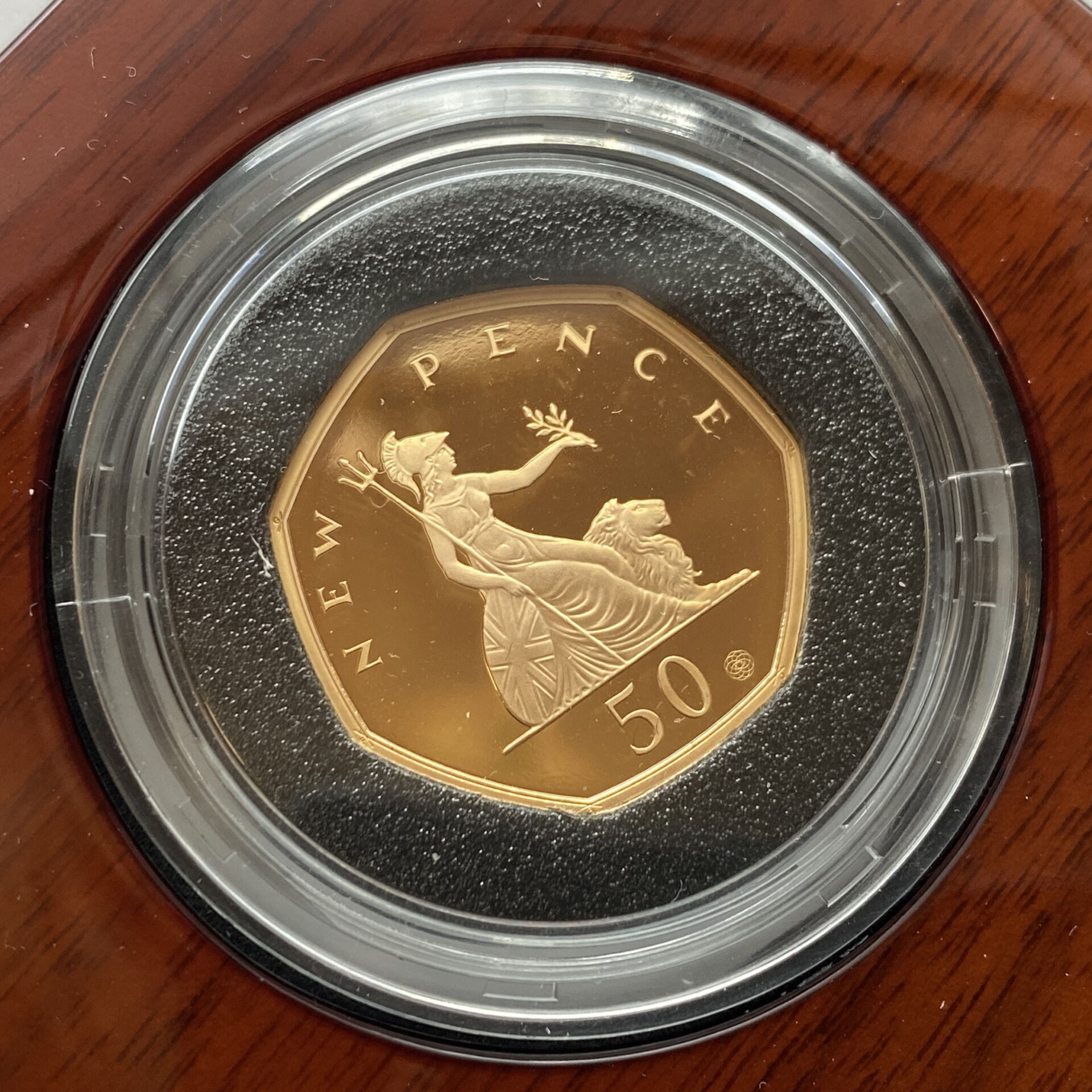50 YEARS OF THE 50P GOLD COIN - Southgate Auction Rooms