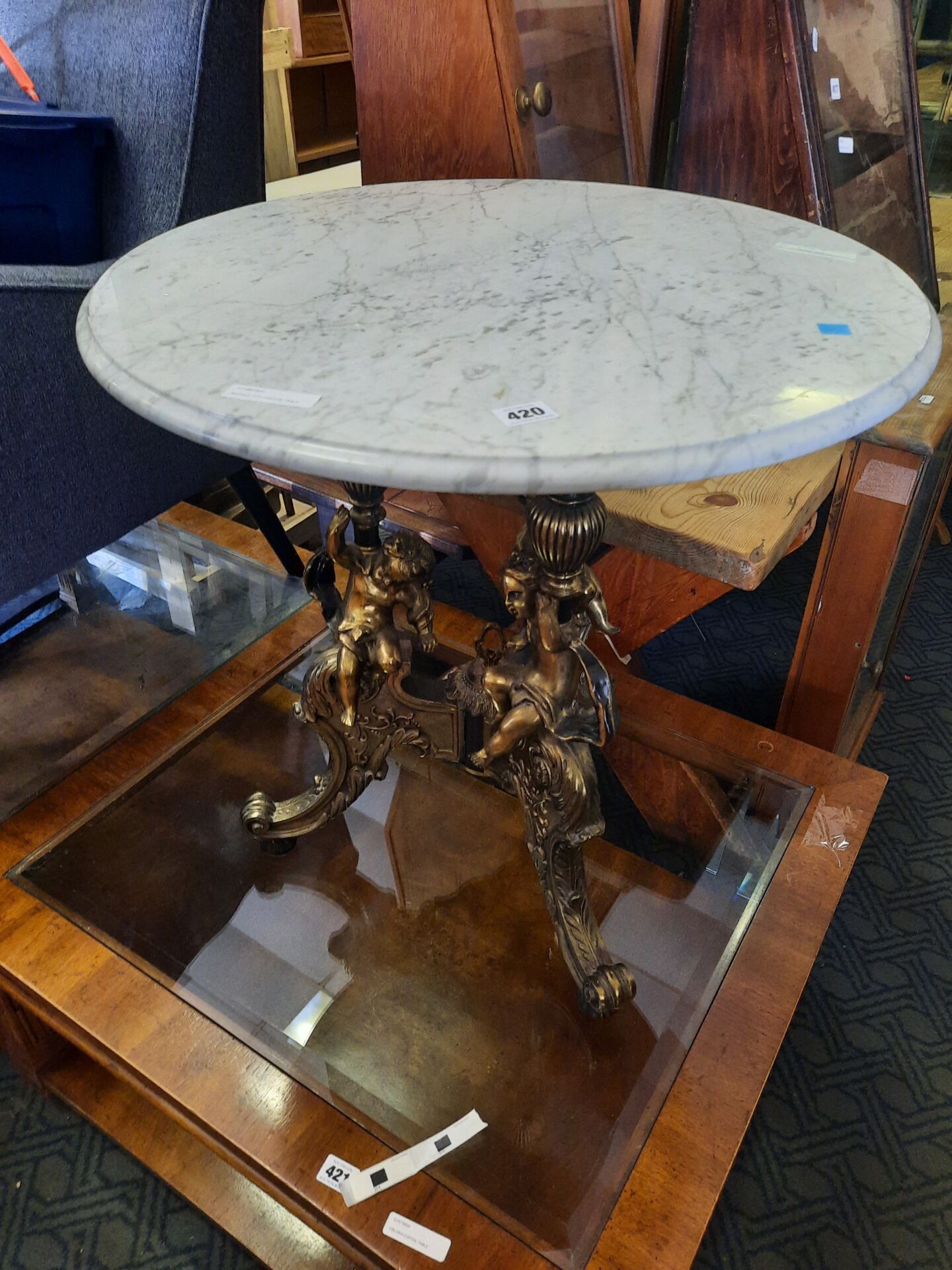MARBLE TOP CHERUB TABLE - Southgate Auction Rooms