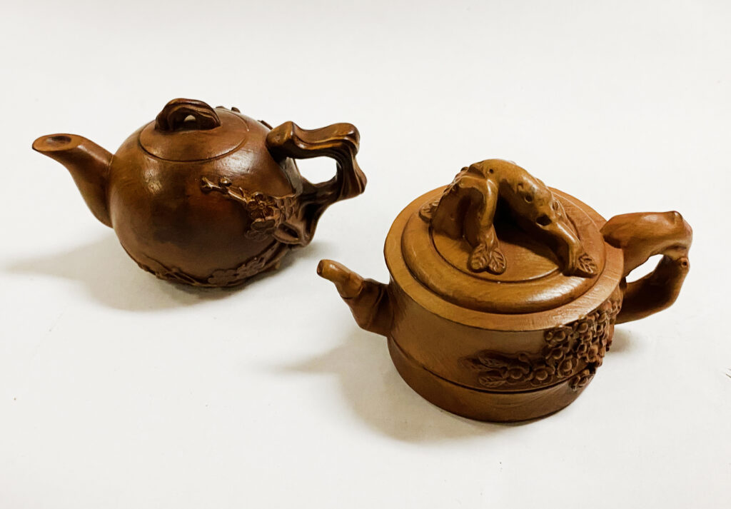 TWO CHINESE WOODEN TEAPOTS - Southgate Auction Rooms