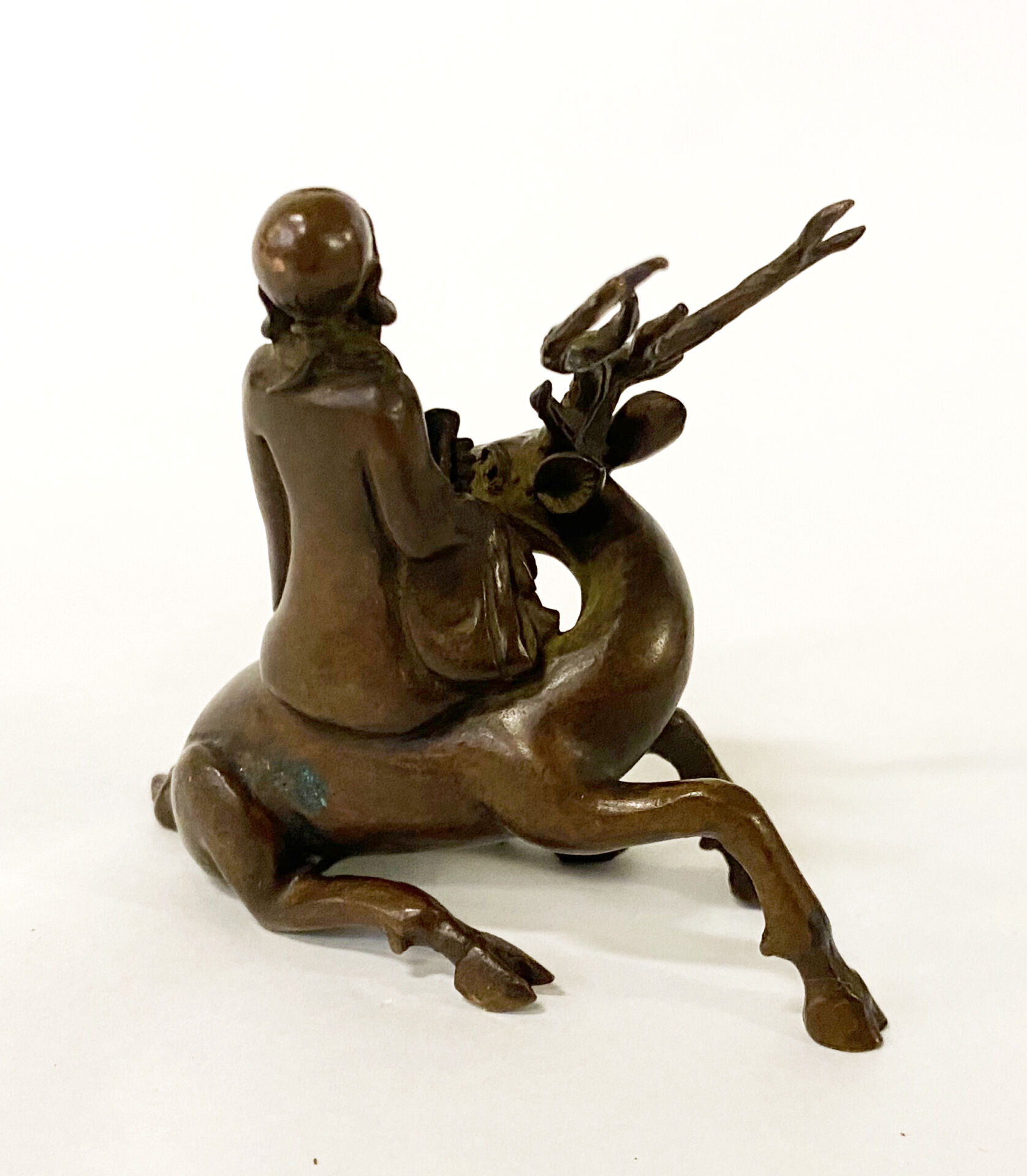 BRONZE GOD WITH DEER - Southgate Auction Rooms