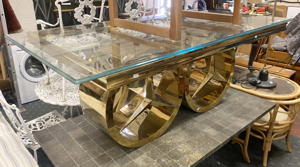 GLASS TOP MERCEDES BENZ COFFEE TABLE - Southgate Auction Rooms