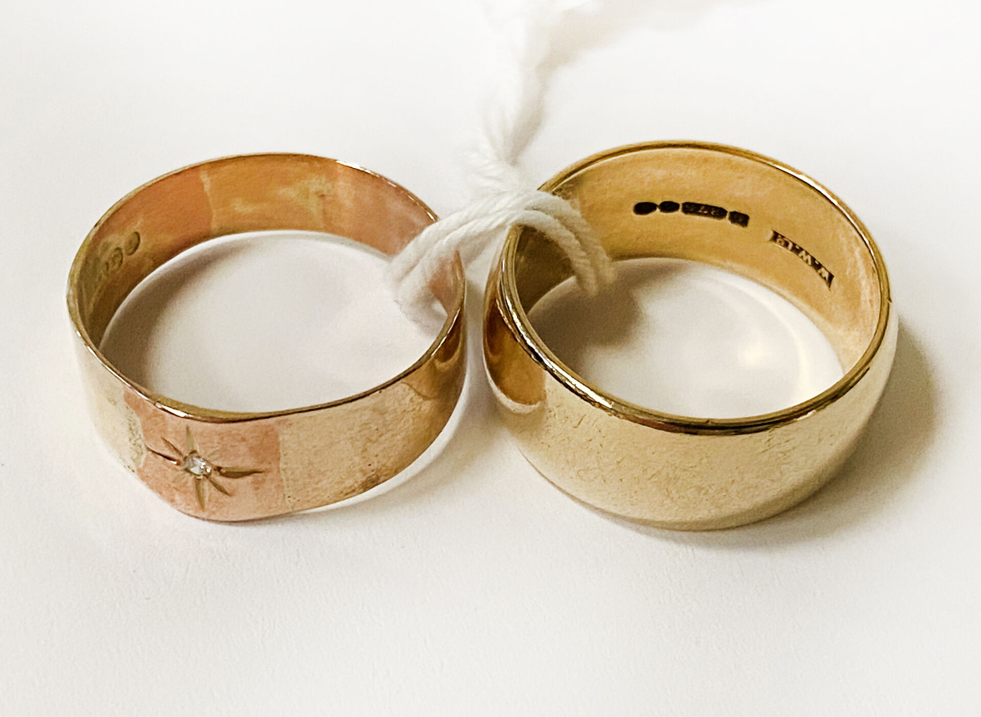 TWO 9CT GOLD WEDDING RINGS - SIZES U & X - 12.5 GRAMS APPROX ...