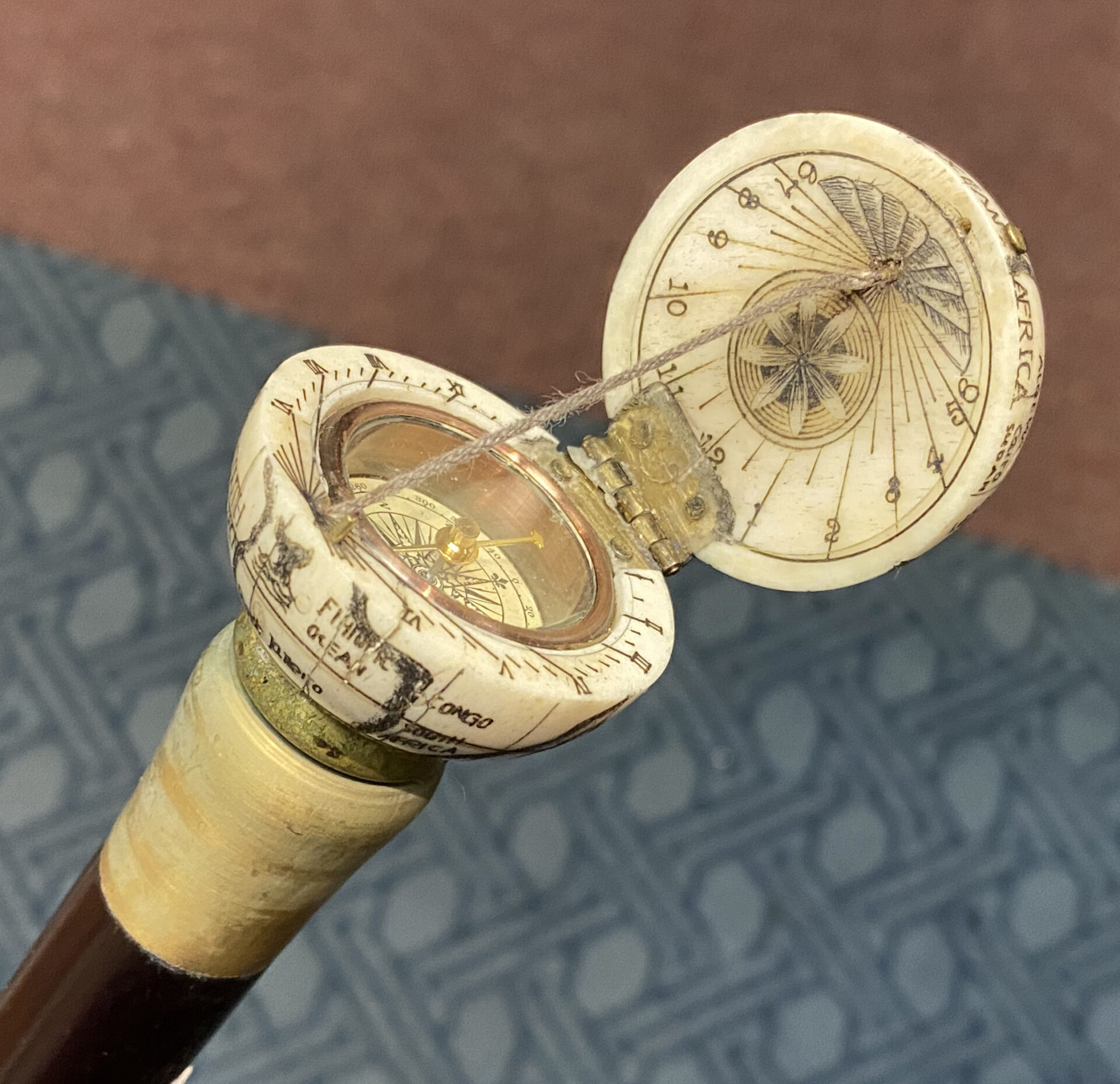 BONE GLOBE COMPASS WALKING STICK - Southgate Auction Rooms
