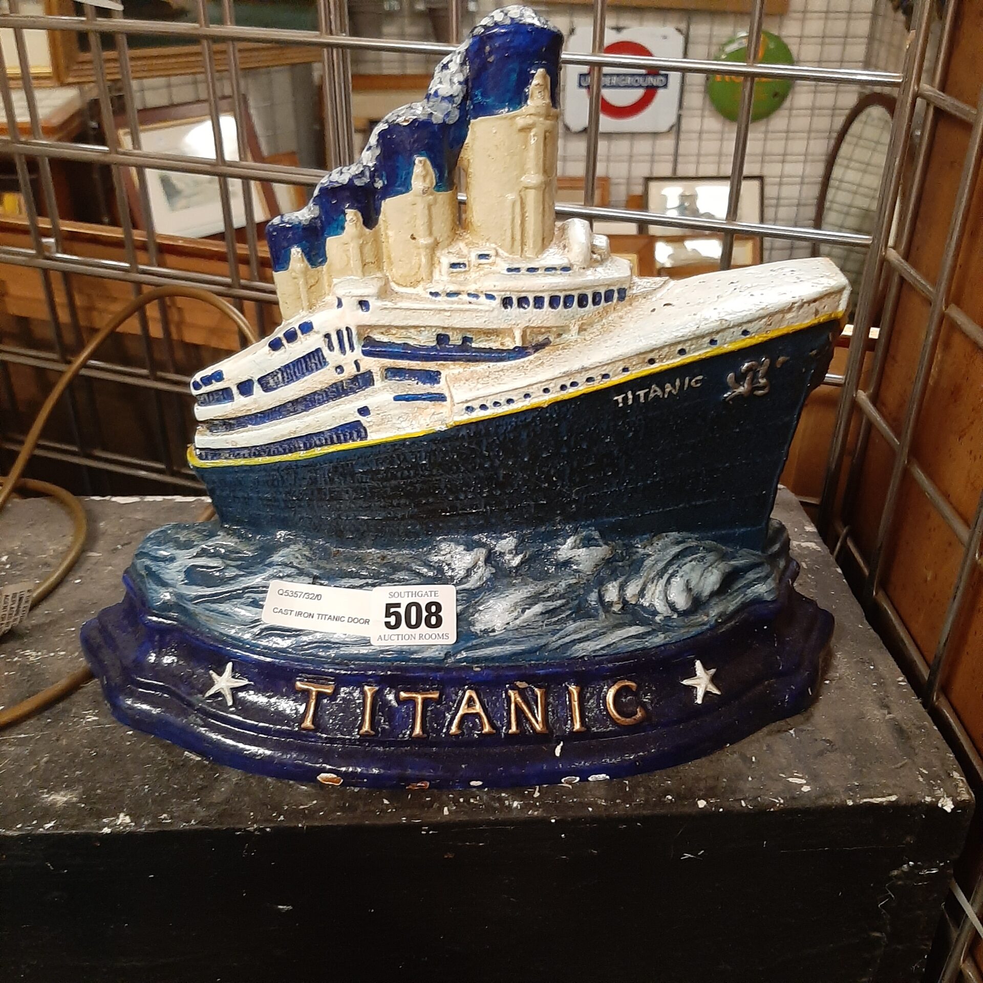 CAST IRON TITANIC DOOR STOP - Southgate Auction Rooms