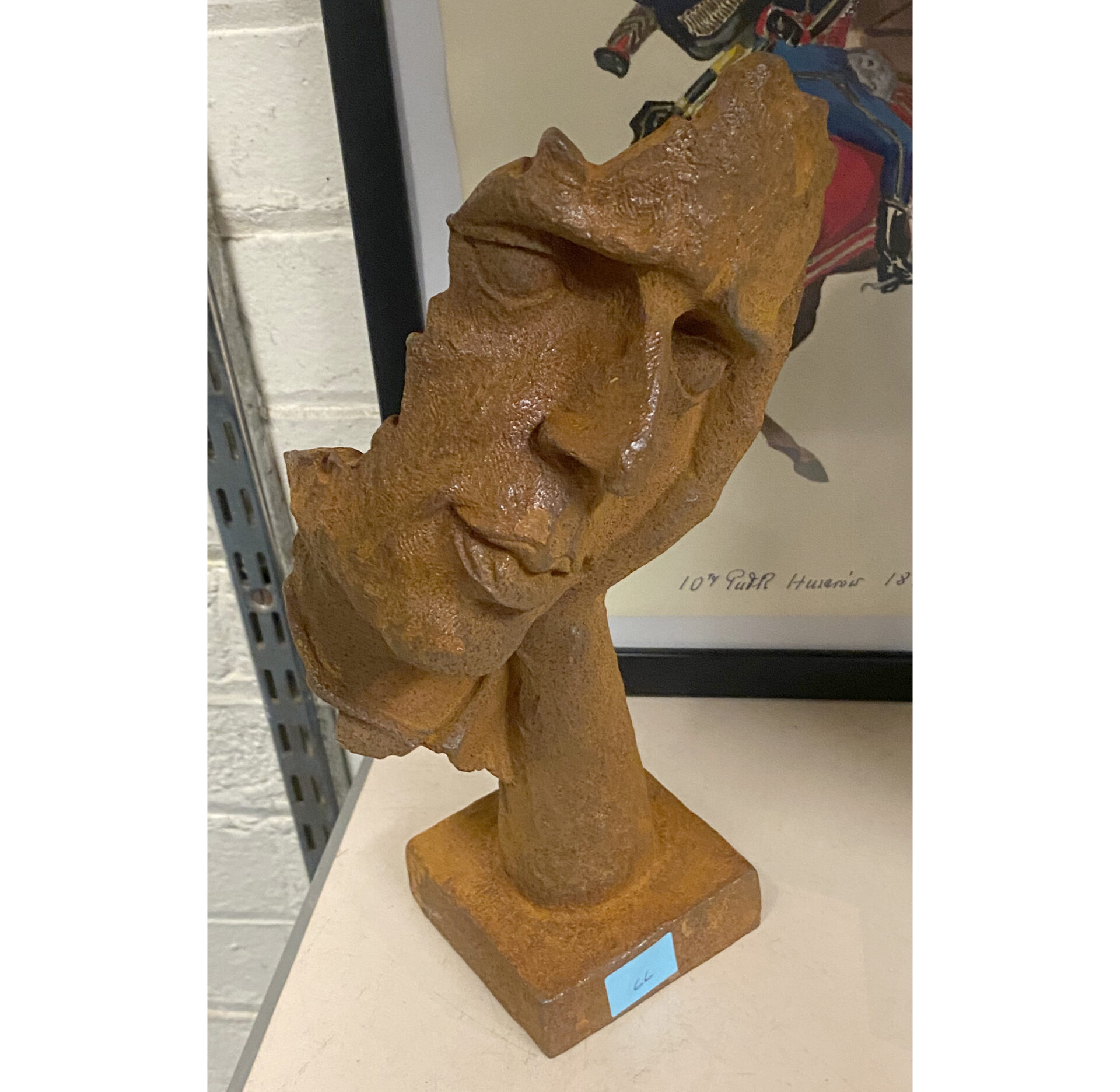 CAST IRON FACE SCULPTURE - Southgate Auction Rooms