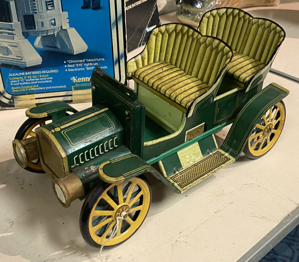 TIN PLATE MODEL CAR - Southgate Auction Rooms