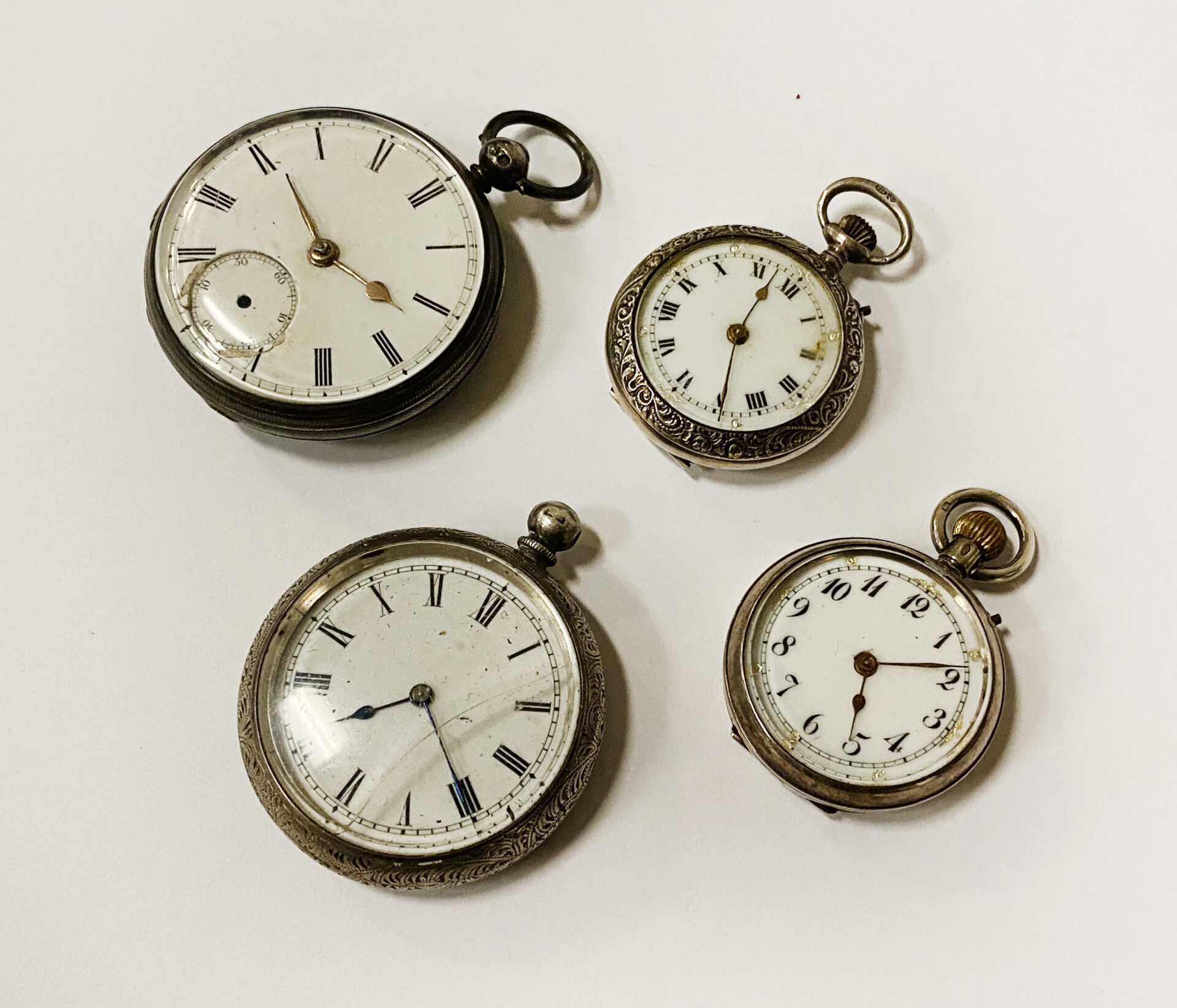 BOX OF MINIATURE SILVER POCKET WATCHES - Southgate Auction Rooms